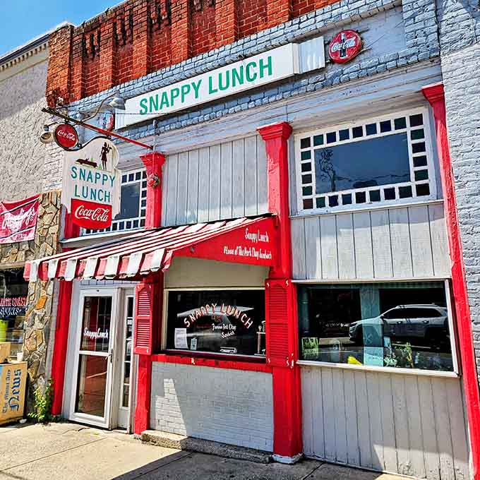 Coca-Cola signs and vintage charm frame this Main Street treasure where locals have gathered for generations.