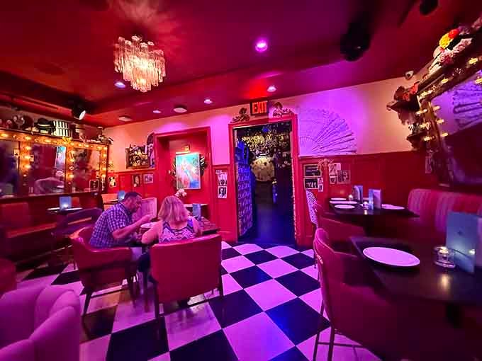 Crystal chandeliers sparkle above cozy booths where every meal feels like a glamorous night out in Atlantic City.