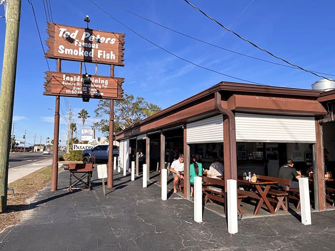 Simple wooden picnic tables outside Ted Peters invite you to enjoy their legendary smoked fish in true Florida fashion.