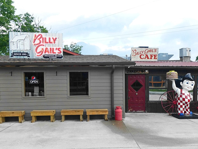 That cheerful mascot and rainbow promise tell you everything: this roadside cafe delivers honest meals with a smile every time.