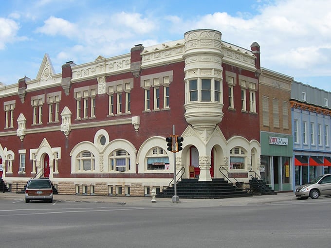 The Brown Grand Theatre's ornate façade whispers of evenings when people dressed up for entertainment rather than just streaming it in their pajamas.