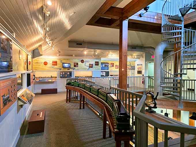 Inside, exposed beams and thoughtful displays create a space that honors railroad history with genuine care.