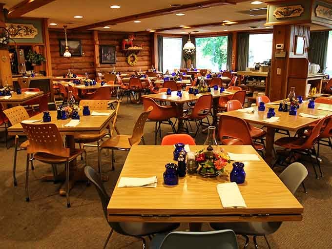 Warm wood tones and those iconic blue bottles create a dining room that feels like a hug from your favorite aunt.