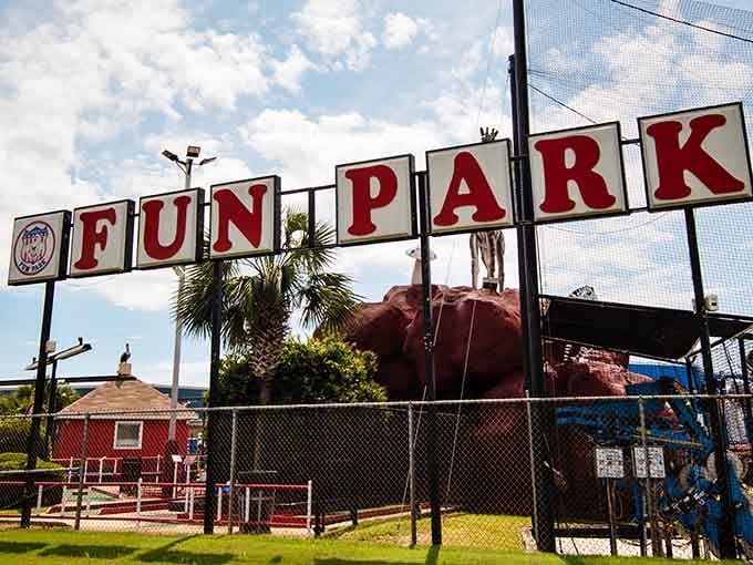 That vintage-style sign promises exactly what's inside: pure, uncomplicated fun without the corporate polish or pretense.