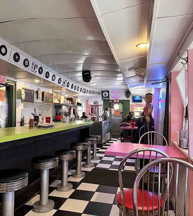 Chrome stools, checkered floors, and pink booths create the perfect setting for your time-traveling lunch date today.