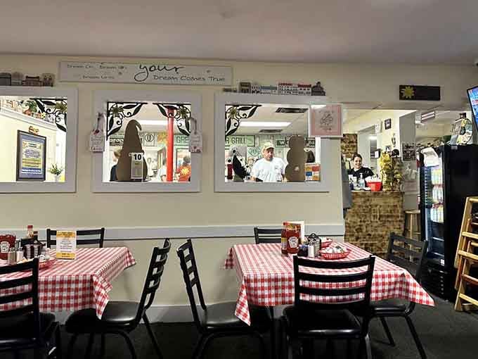 Red checkered tablecloths and pass-through windows to the kitchen mean they've got nothing to hide and everything to share.