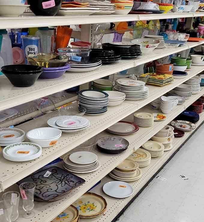 Stacks of plates and bowls waiting to host your next dinner party without requiring a second mortgage.