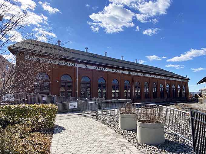 The roundhouse stands like a temple to the iron horse era, ready to welcome modern pilgrims.