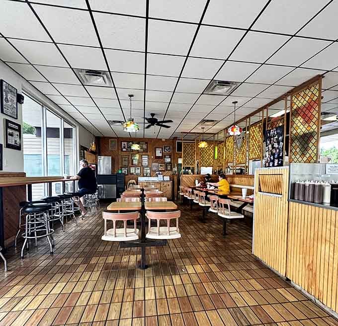 Wood paneling and booth seating create that classic diner vibe where comfort food feels right at home.