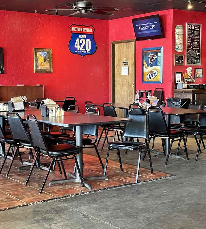 Red walls and simple chairs create the perfect no-nonsense backdrop for pizza that does all the talking.