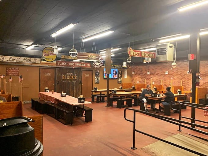 Communal tables where strangers bond over brisket, proving that great barbecue is the ultimate social lubricant in Texas.