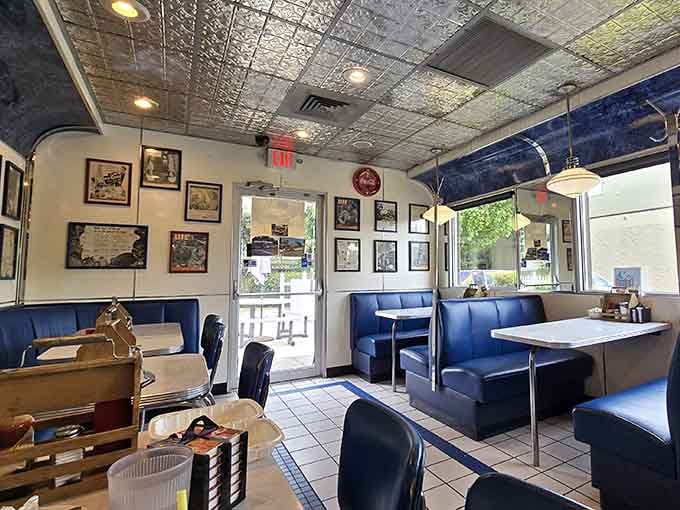 Blue vinyl booths and tin ceilings create the kind of atmosphere where time slows down deliciously.