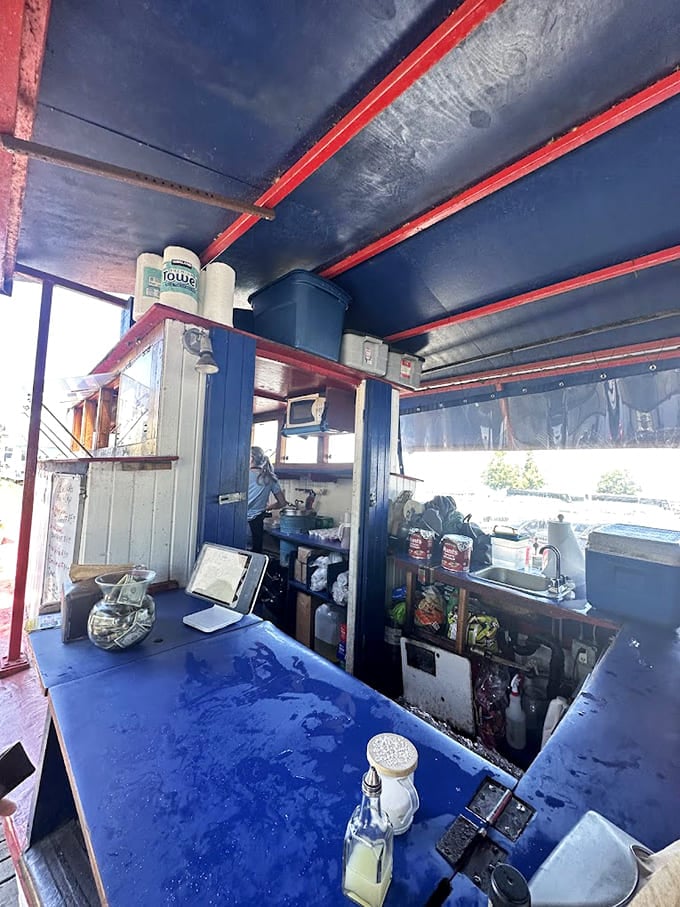 The tiny galley where magic happens, proving great food doesn't need square footage or fancy equipment.