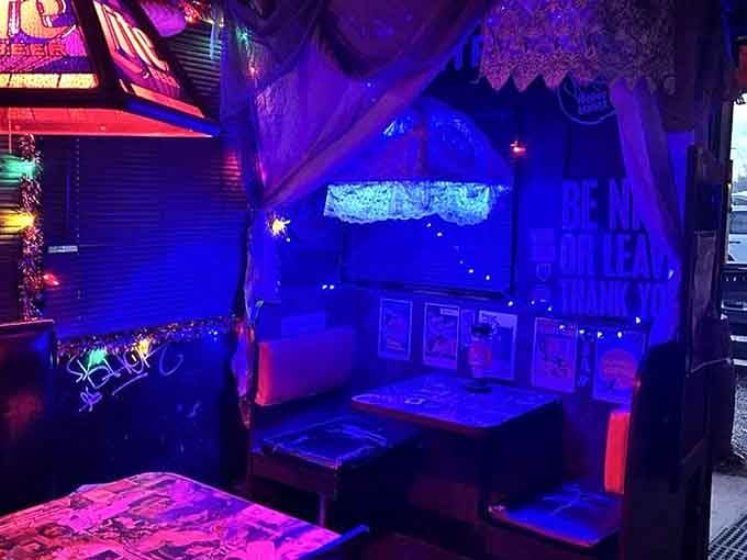 Purple neon dreams meet dive bar reality in the most spectacular collision of vibes you'll ever experience.