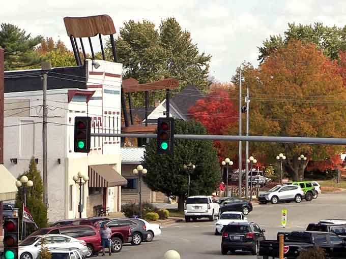 That rocking chair isn't compensating for anything, it's just confidently towering over downtown like a friendly wooden skyscraper.