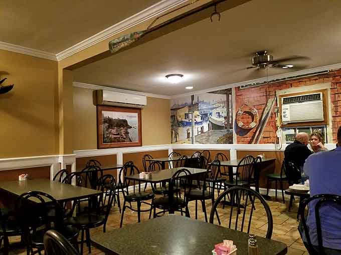 Inside, maritime murals and cozy booths set the stage for a proper New England seafood feast.