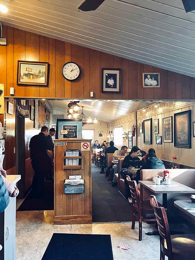 Wood paneling and cozy booths create the perfect time-capsule diner experience you've been craving all along.