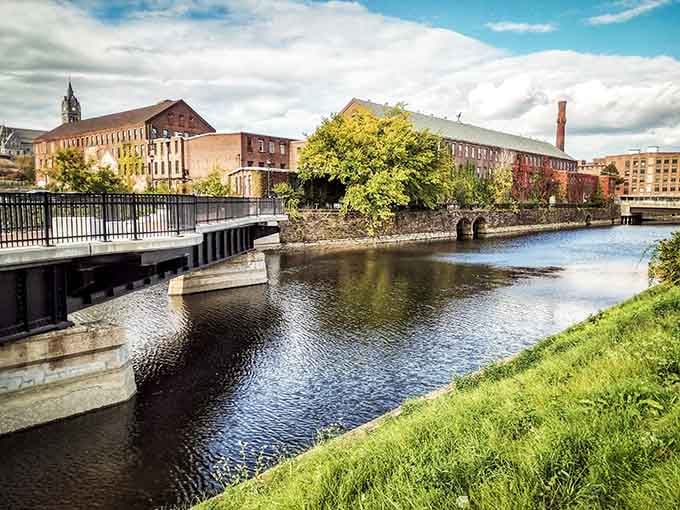 The Chicopee River winds through historic mill buildings, proving industrial heritage can actually photograph beautifully.