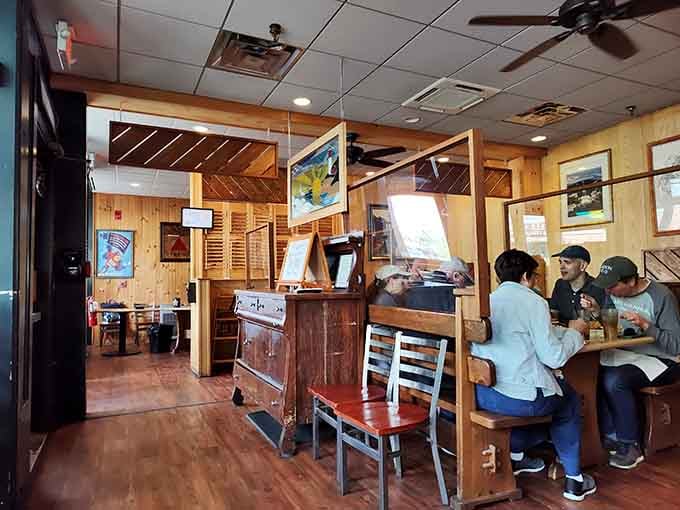 Wood paneling, cozy booths, and the promise of exceptional food make this the neighborhood pub of your dreams.