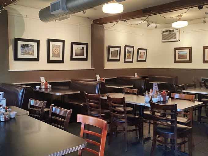 Clean lines, comfortable booths, and framed art that doesn't try too hard. This is breakfast done right.