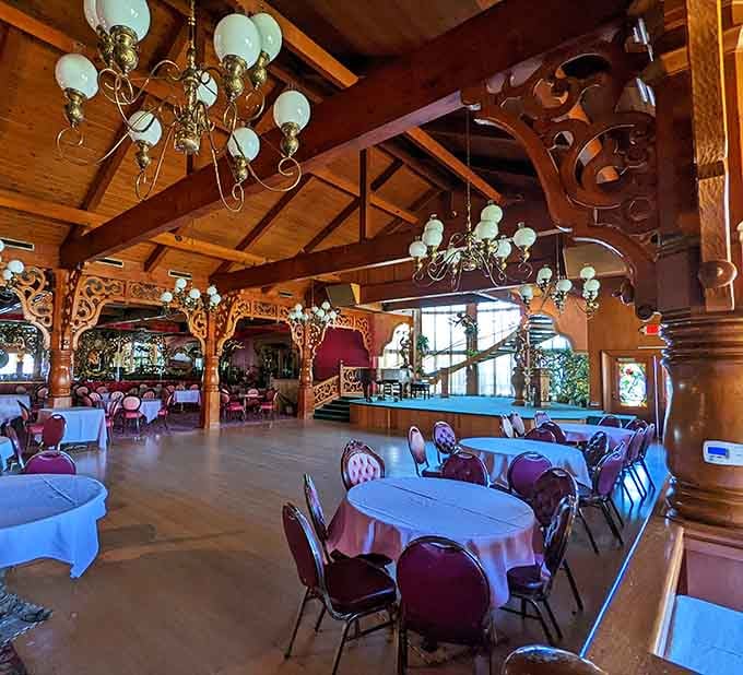 Those exposed beams and ornate fixtures create an atmosphere that's equal parts rustic charm and elegant sophistication.