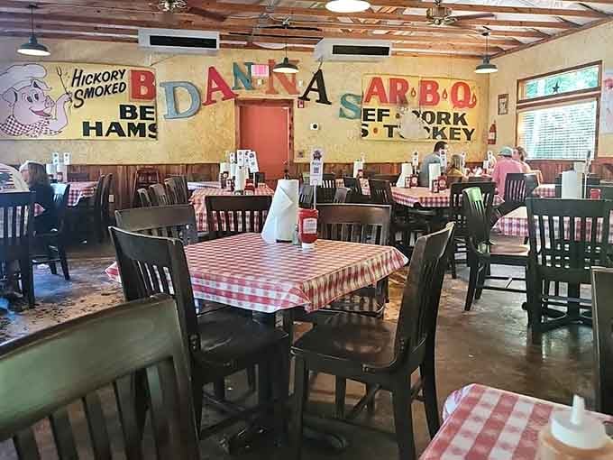Red checkered tablecloths and colorful signs create the perfect no-fuss atmosphere for serious eating and zero pretension.