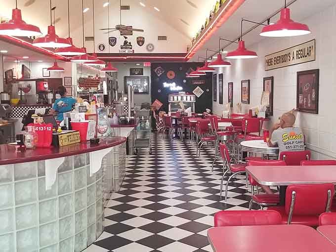 Chrome, checkered floors, and cherry red everything: this is what diners looked like when America knew how to have fun.