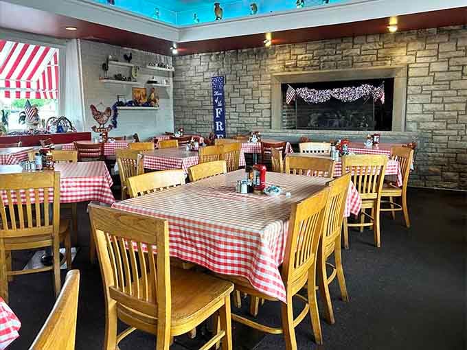 Red checkered tablecloths and stone walls create the kind of cozy atmosphere your grandmother would approve of wholeheartedly.