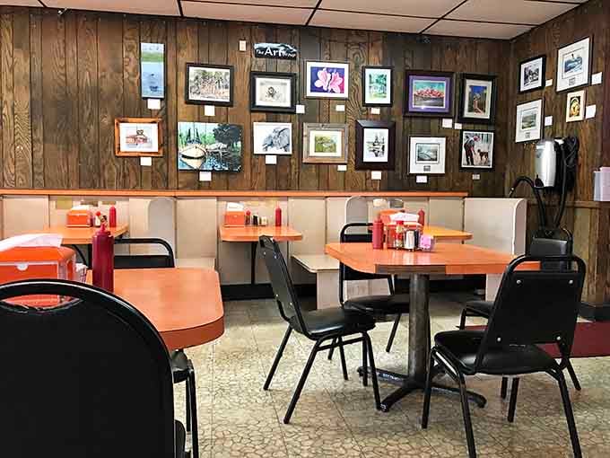Wood paneling and framed local art create an atmosphere that feels like your favorite uncle's rec room, but with better food.