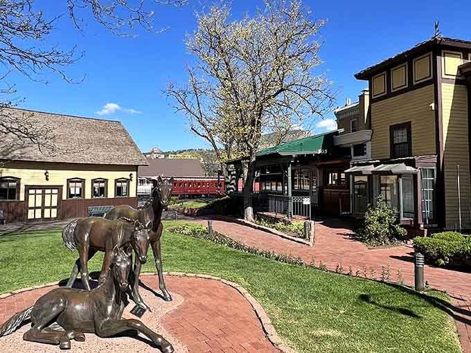 Bronze deer greet visitors at the depot, standing eternal watch over a railroad that's outlasted empires.