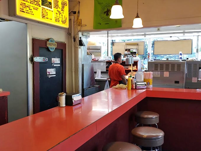 That bright orange counter inside feels like stepping into a time machine set for simpler, tastier days.