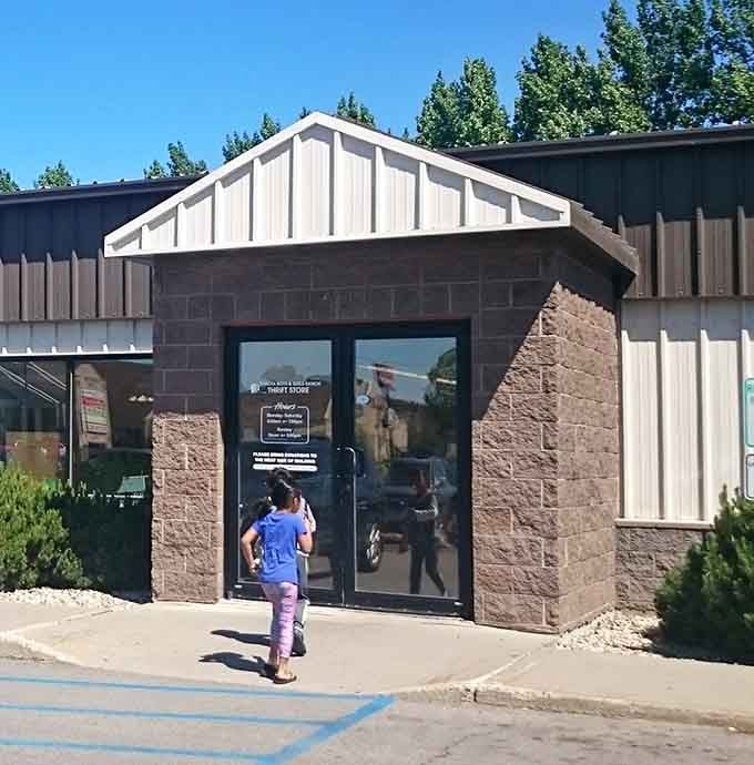 The entrance beckons like a portal to bargain paradise. That person heading in has no idea they might emerge three hours later with unexpected treasures.
