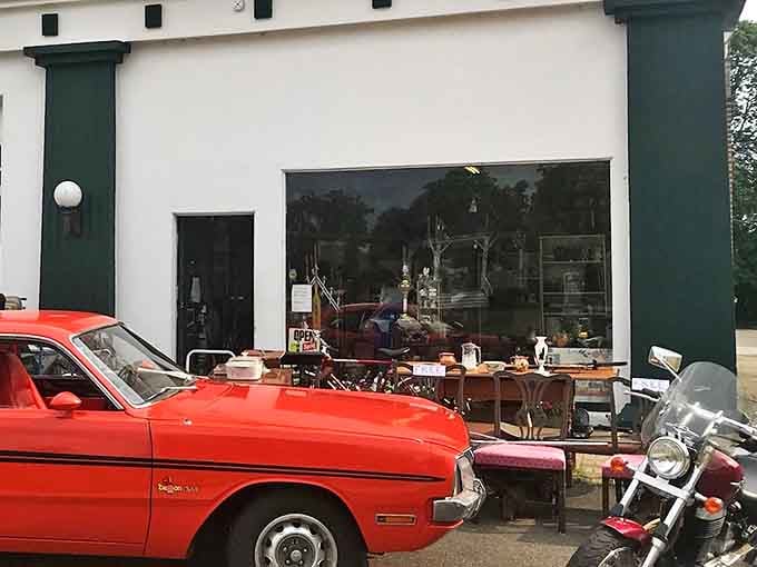 Where yesterday meets today&mdash;vintage furniture spills onto the sidewalk while a classic red Dodge adds a perfect pop of color.
