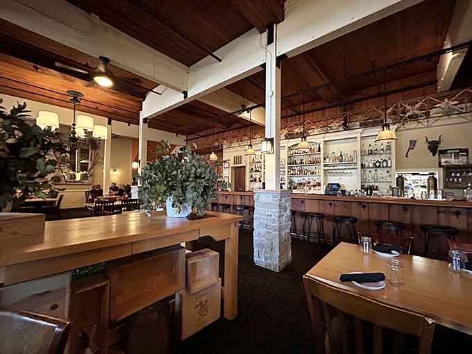 Those soaring wooden beams and exposed brick create the kind of warm, inviting space where memorable meals naturally happen.