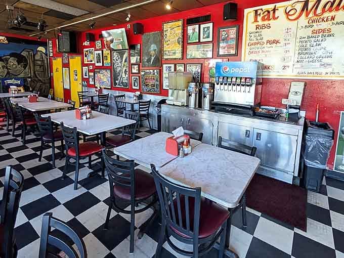 The checkered floor and red walls create a vibe that's part diner, part blues club, all delicious.