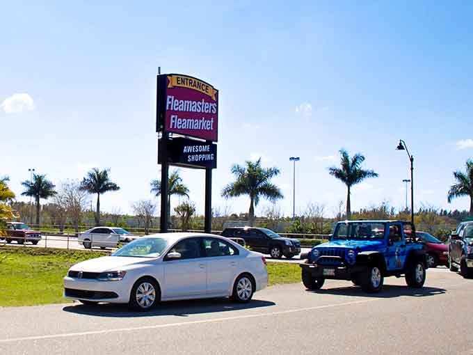 The palm trees and "Awesome Shopping" sign aren't lying, this parking lot is your gateway to bargain paradise.