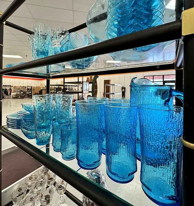 Those blue glasses catch the light like liquid sapphire, making ordinary water feel like a fancy occasion.