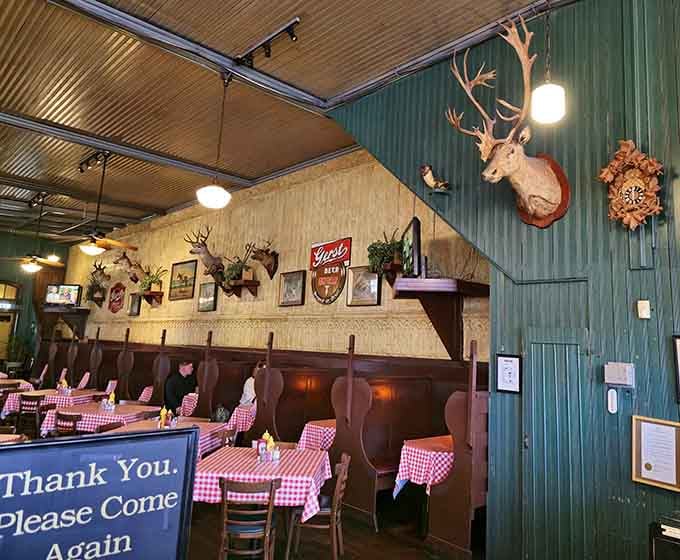 Mounted trophies and corrugated metal walls create an atmosphere that's equal parts hunting lodge and Bavarian beer hall.