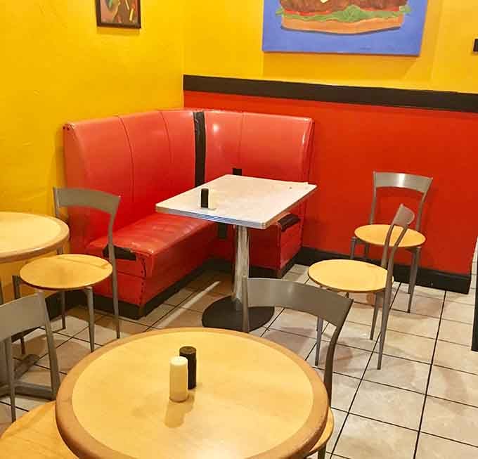 Those red vinyl booths and sunshine-yellow walls create the kind of cheerful atmosphere that makes everything taste better, which is saying something.