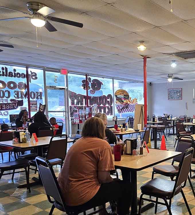 Simple tables, ceiling fans, and satisfied diners create the kind of comfortable atmosphere where good food takes center stage.