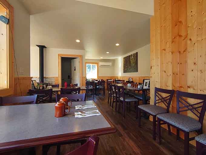 Wood paneling and natural light create the kind of cozy atmosphere where time slows down and breakfast matters.