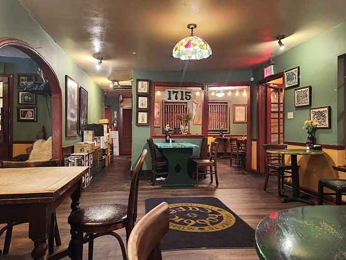 Green walls and wooden touches create that cozy Shire vibe you've been craving since 2001.