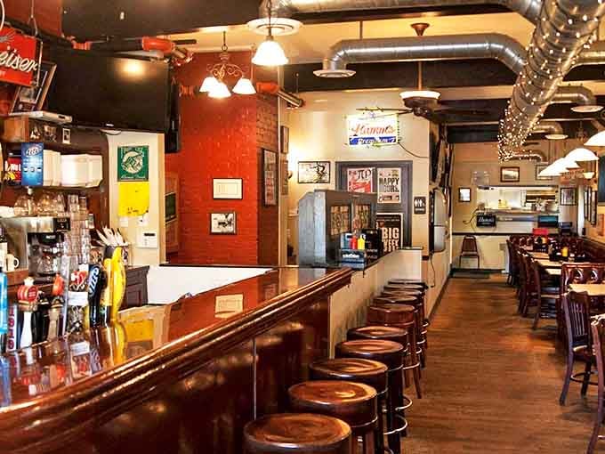 Pull up a stool at this classic wood-paneled bar where Minnesota nice meets burger paradise. The worn seats tell stories of countless satisfied customers.