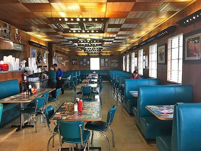 The turquoise vinyl booths have witnessed decades of barbecue bliss. If these walls could talk, they'd probably just say "Pass the hush puppies."