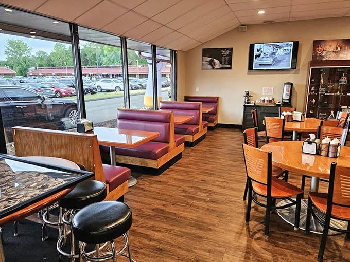 Simple wooden booths and burgundy vinyl seating say, "We're serious about the food, not the frills." Classic BBQ joint wisdom at its finest.