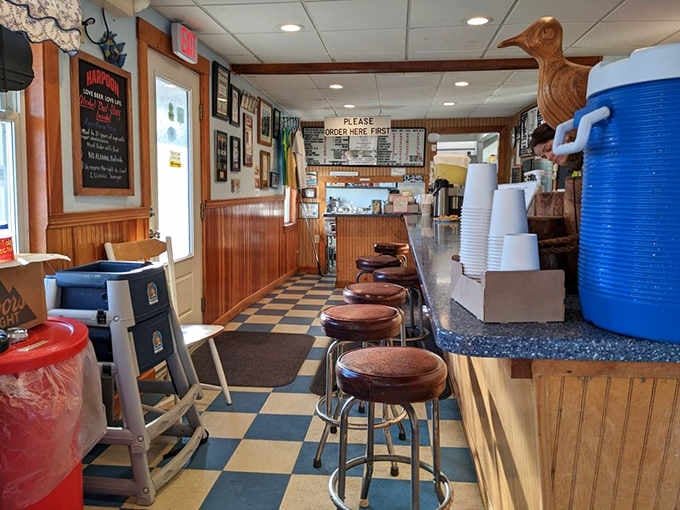 Checkered floors and vinyl stools set the stage where fried seafood dreams come true, one golden bite at a time.