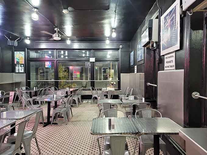 Industrial chic meets comfort food heaven in this sleek dining space where metal chairs never looked so welcoming.