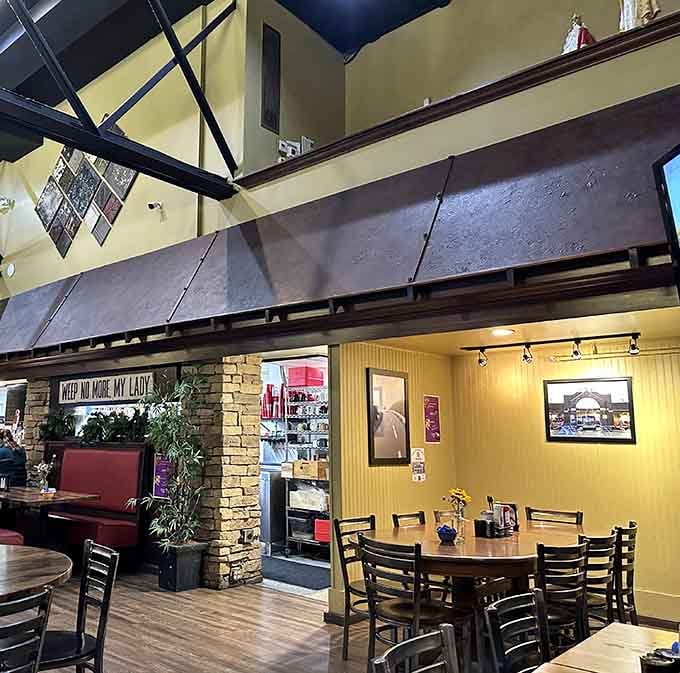 High ceilings and warm lighting create a space that feels both spacious and surprisingly intimate for breakfast.