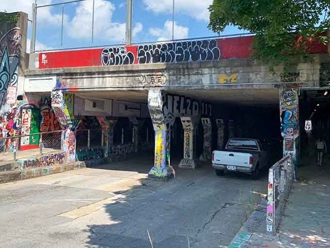 The entrance beckons like a portal to another dimension, where Atlanta's artistic soul spills onto every available surface.
