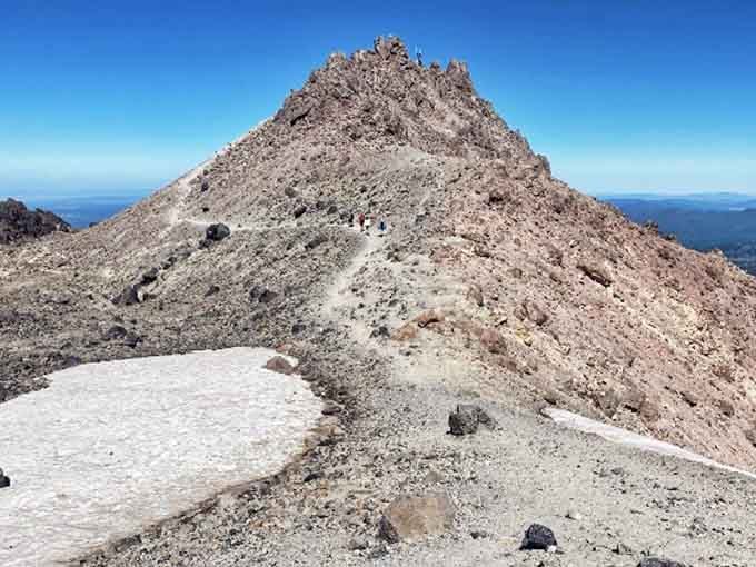 That final push to the summit looks deceptively gentle until you're actually climbing it, gasping for air like a fish.